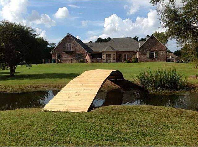55 Backyard Bridge Ideas: Tranquil Perspective for Your Landscape