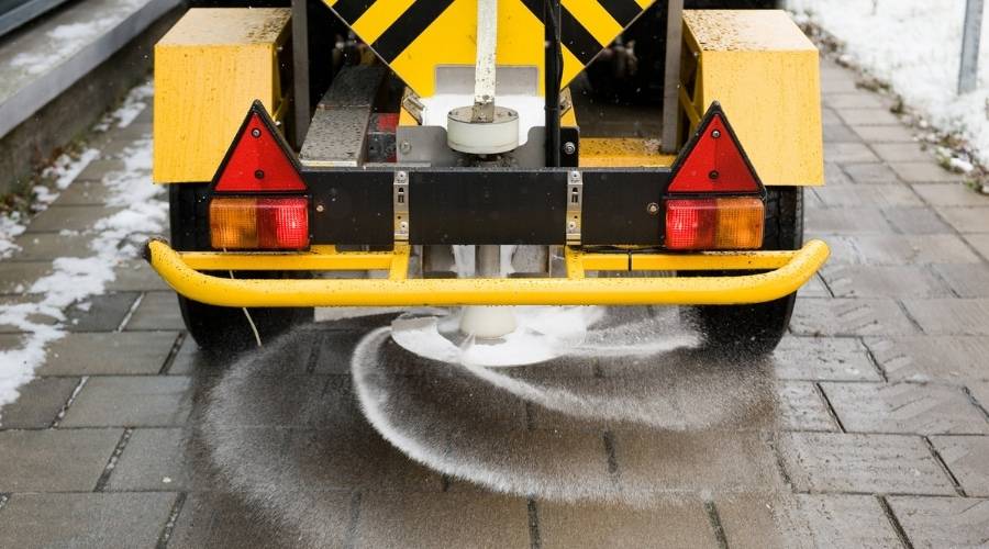How to properly salt/sand your driveway