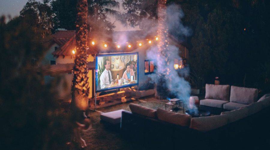 The Best Outdoor Projector Screens to Turn Your Backyard Into a Movie ...
